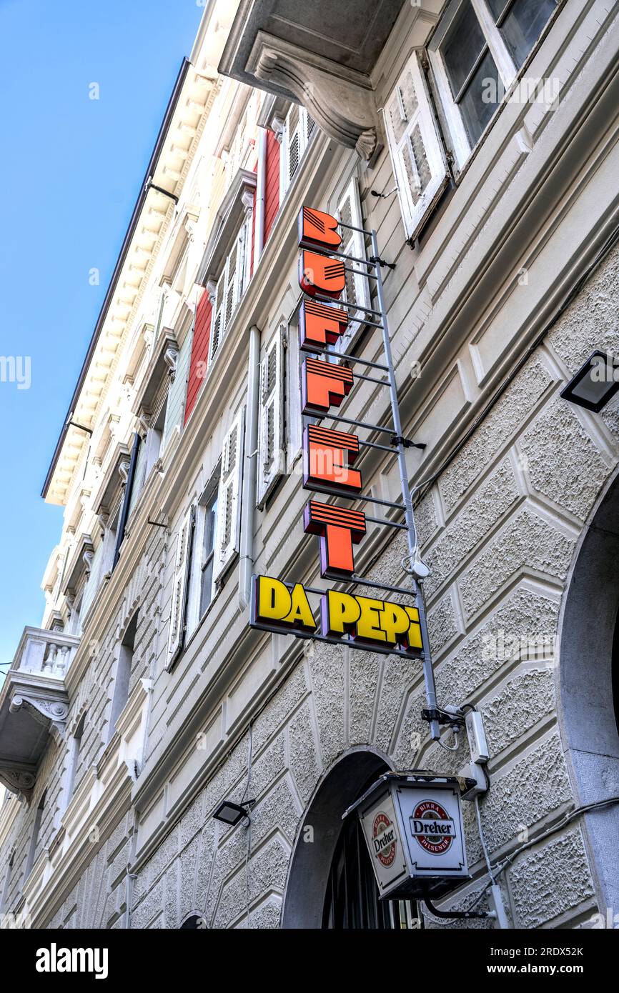 Sign pointing "Buffet da Pepi" restaurant, where you can eat traditional cuisine and meat ...