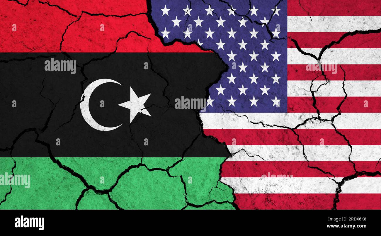 Flags of Libya and USA on cracked surface - politics, relationship ...