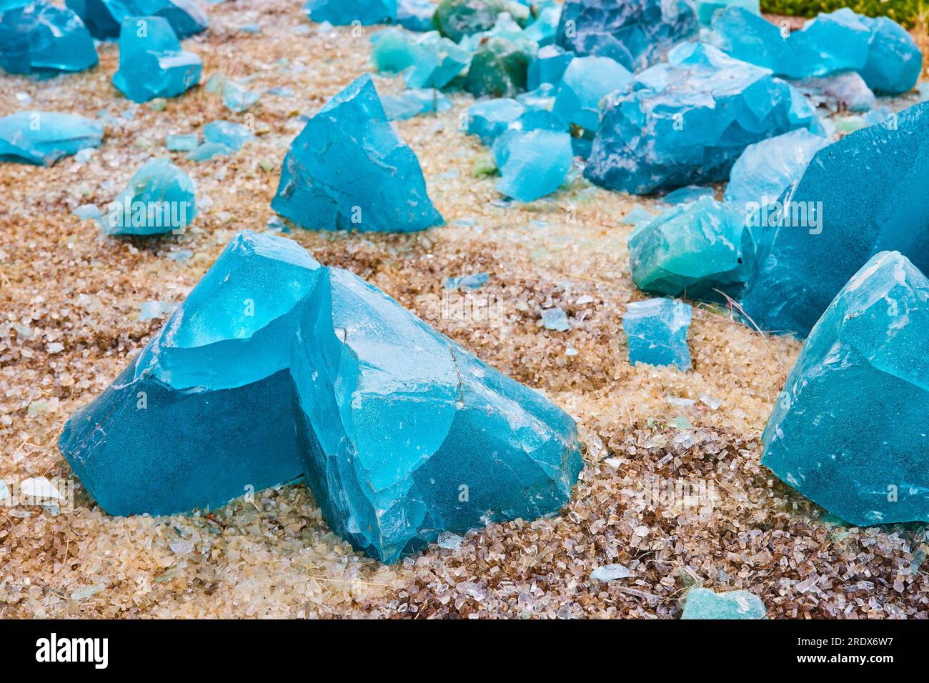 Clear glass fragments with large hunks of sky blue and turquoise mounds ...