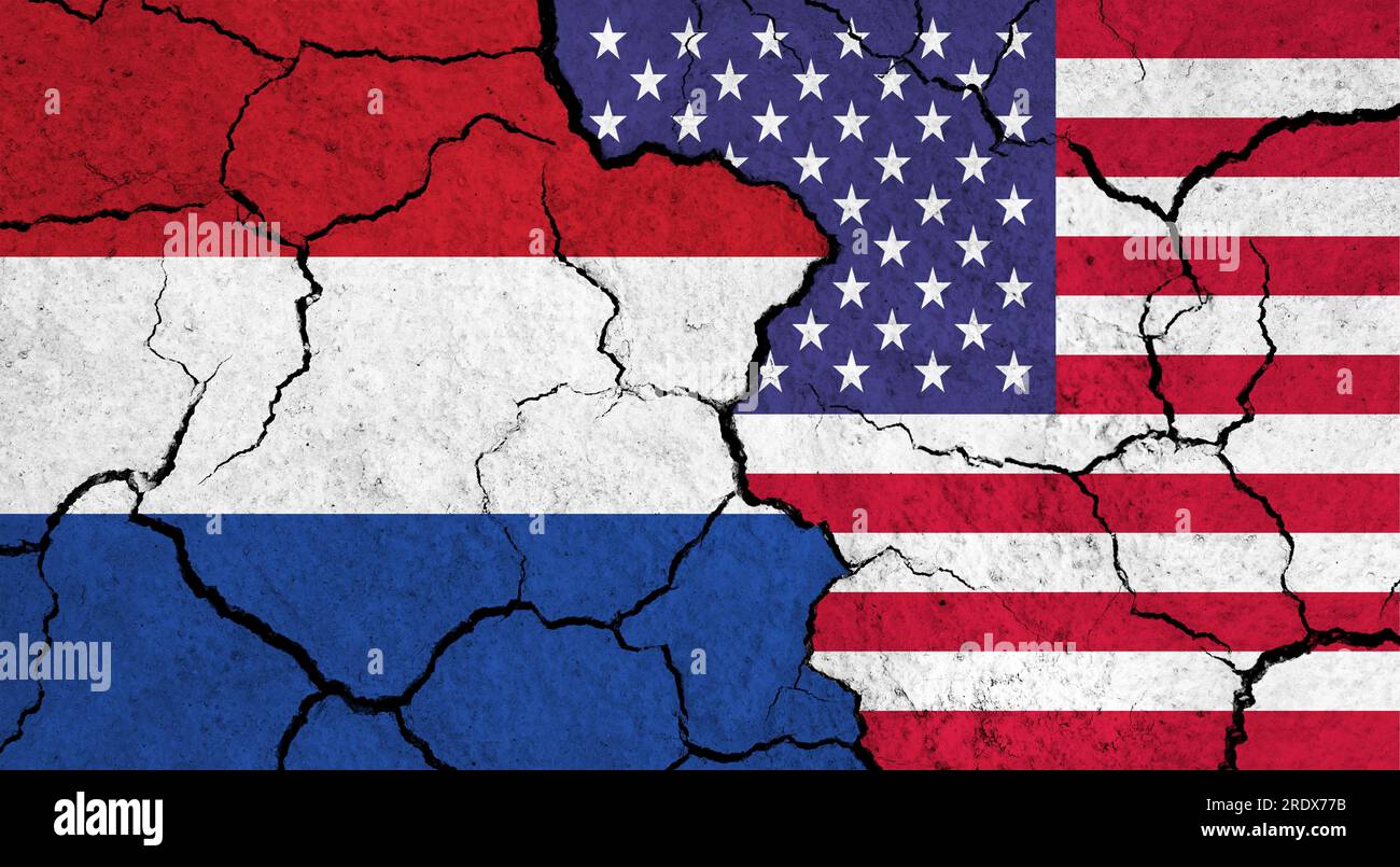 Flags of Netherlands and USA on cracked surface - politics ...