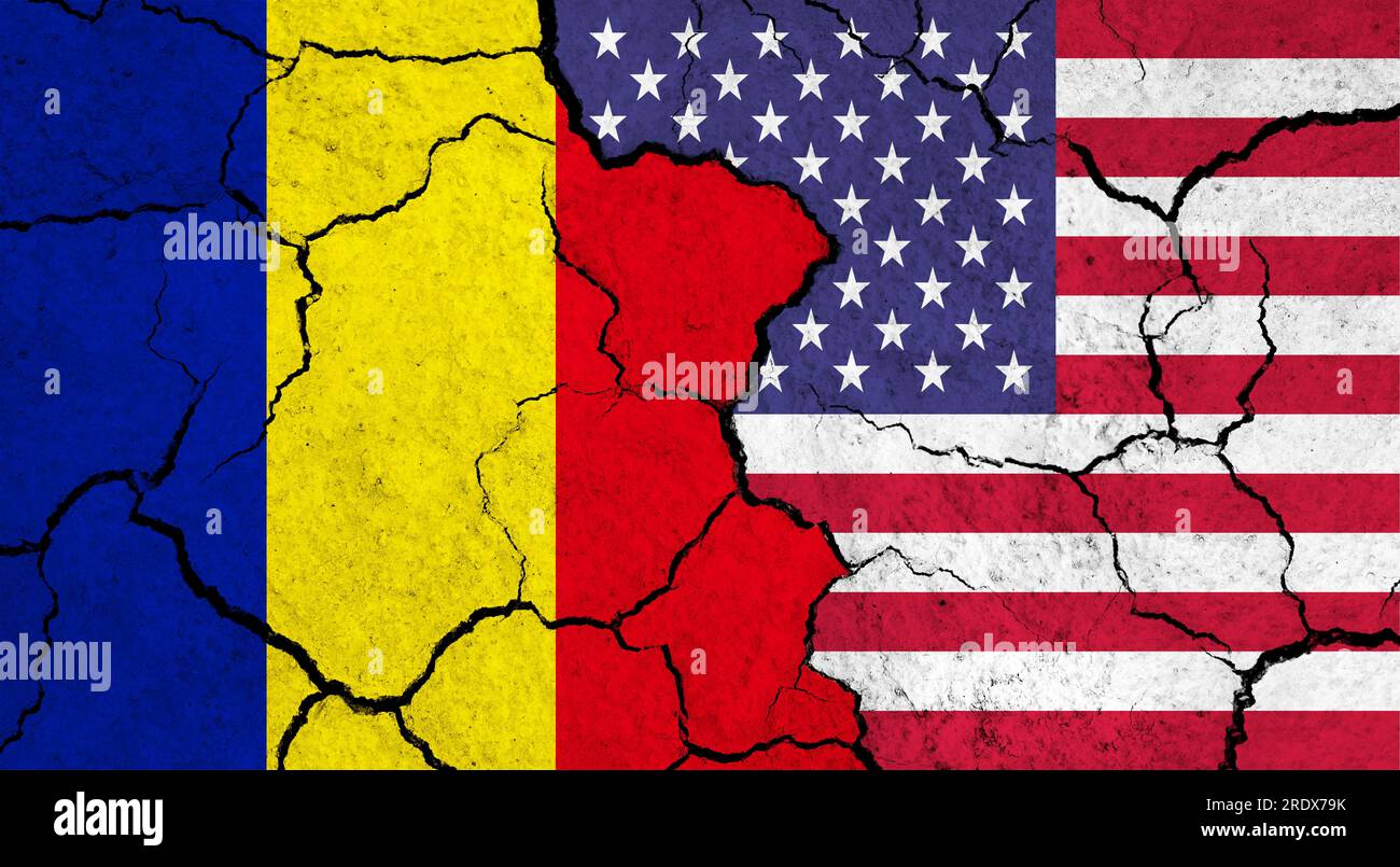 Flags of Romania and USA on cracked surface - politics, relationship ...