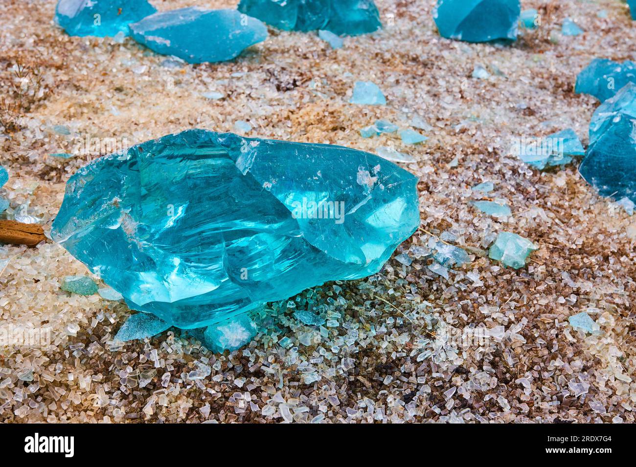 Clear glass fragments with prism of turquoise and sky blue broken glass ...