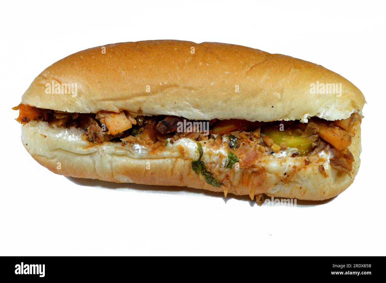 Chicken shawarma sandwich in a a bun, a popular Middle Eastern dish ...