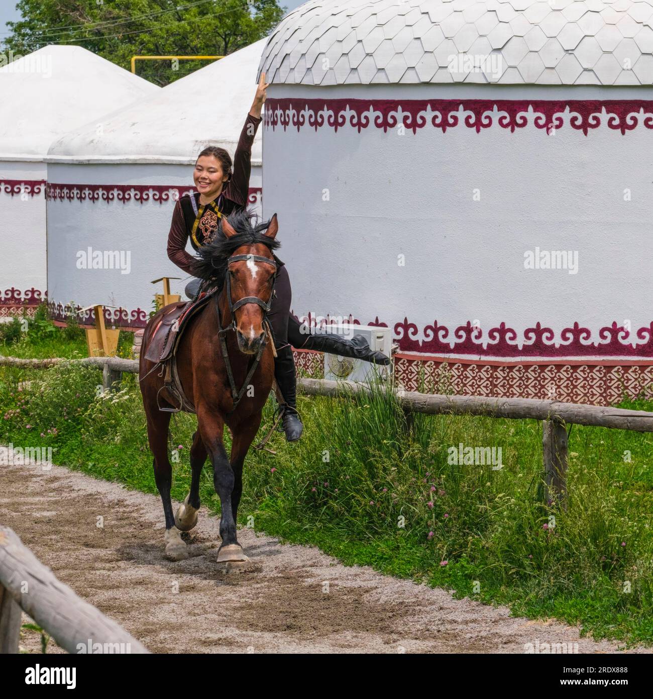 Kazakhstan, Huns Ethno Village. Woman Demonstrating Traditional Kazakh Nomadic Riding Skill ...