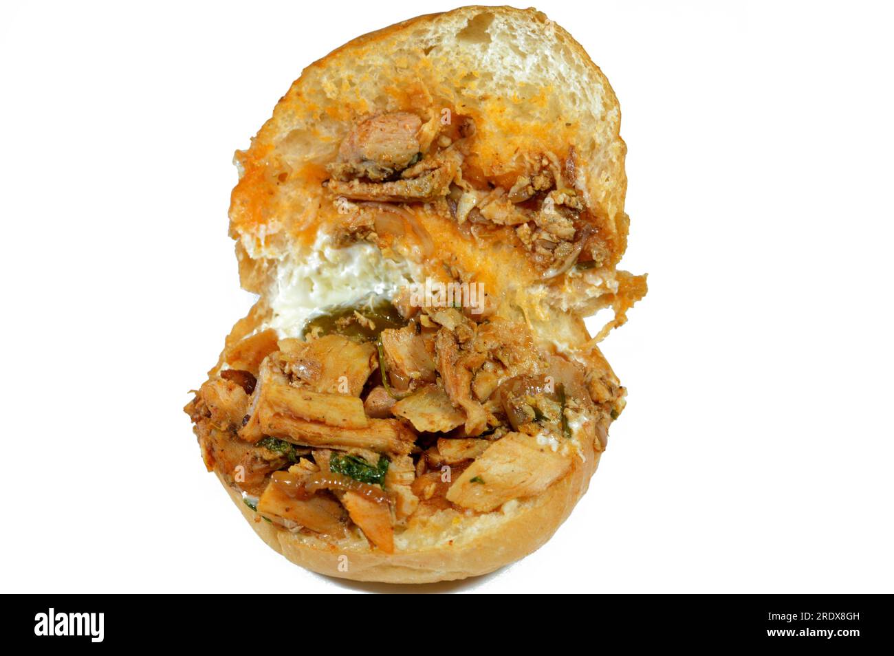 Chicken shawarma sandwich in a a bun, a popular Middle Eastern dish ...