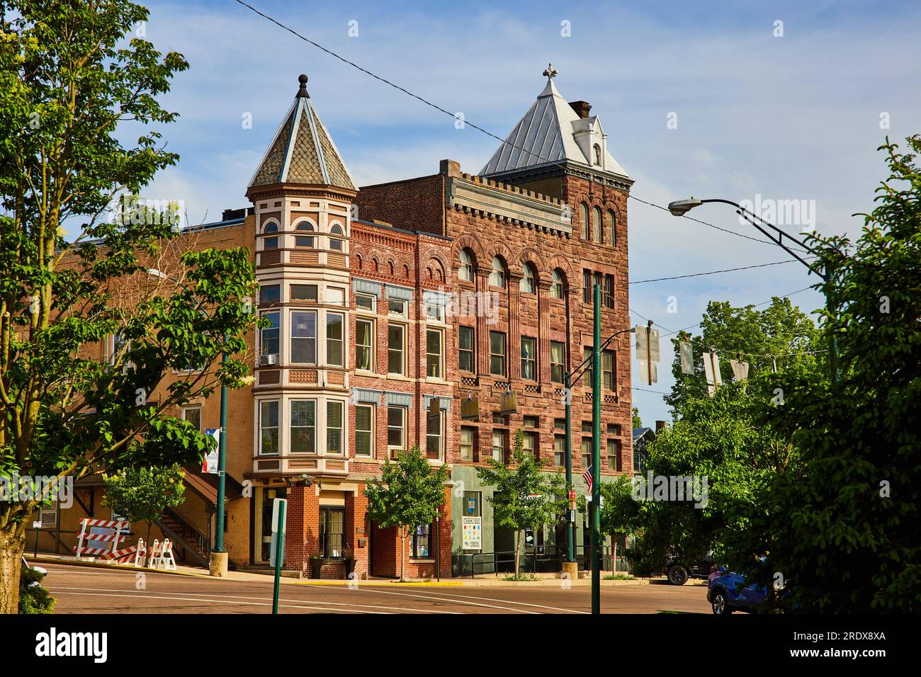 Gorgeous old brick buildings with partial tower and fancy rooftops ...