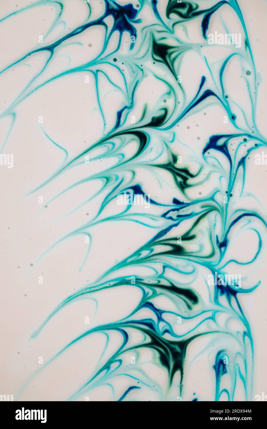 White pattern with green and blue splashes.Milky texture with colored ...