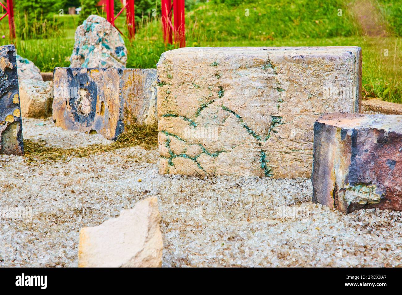 Clear glass ground next to blast zone for destroyed glass factory with ...