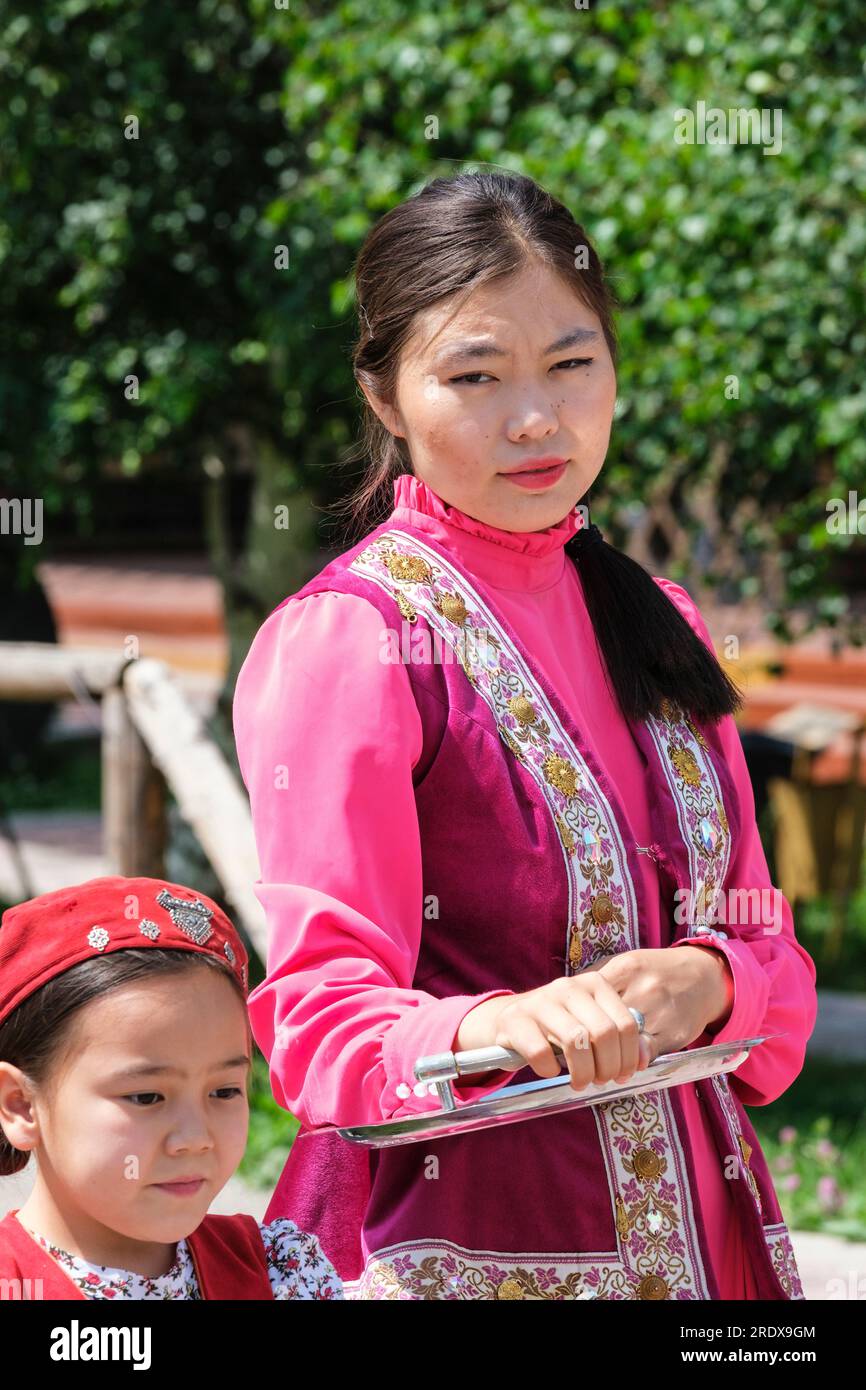 Kazakhstan, Huns Ethno Village. Young Woman and Girl in Traditional ...