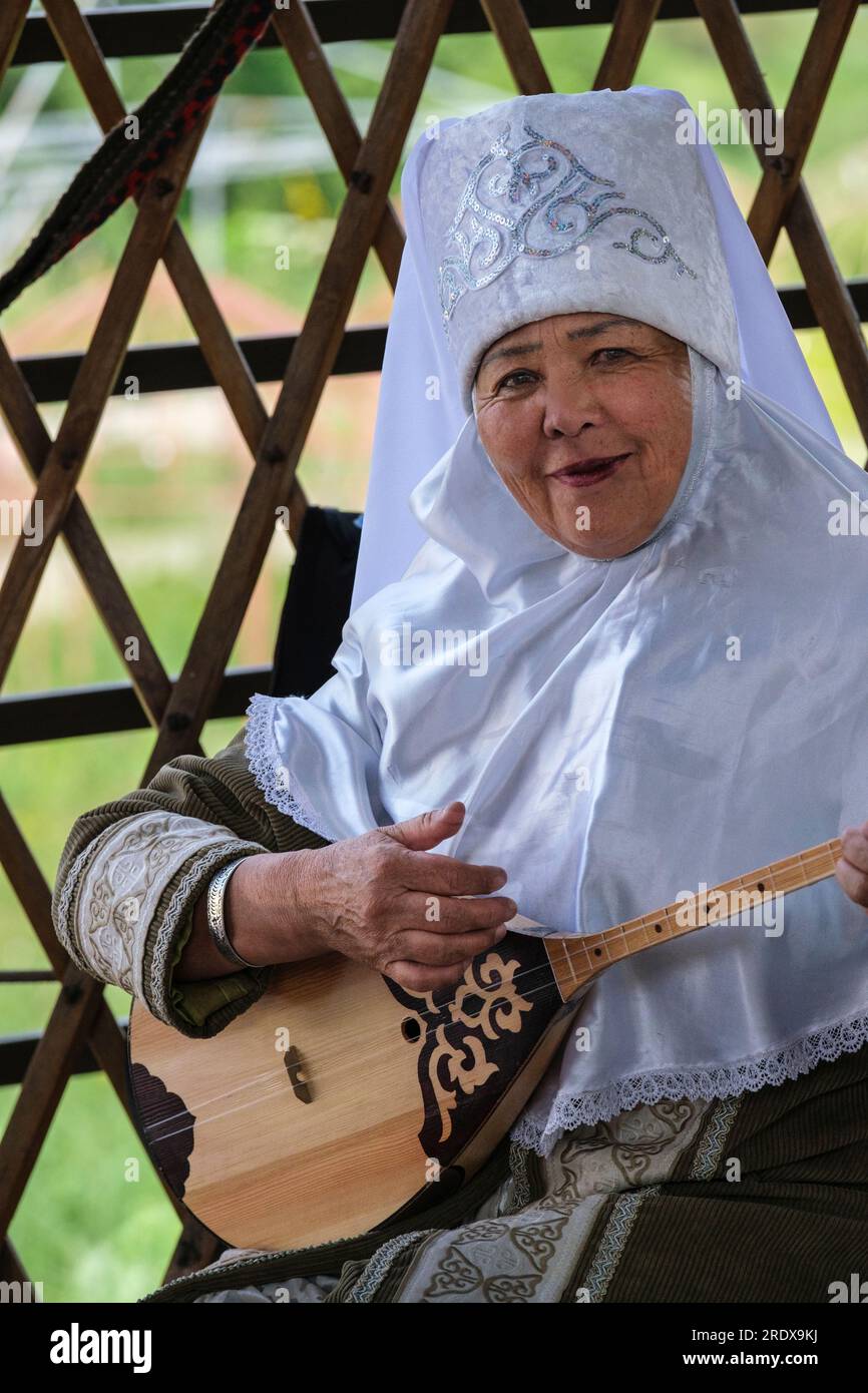 Kazakhstan, Huns Ethno Village. Kazakh Woman in Traditional Dress ...