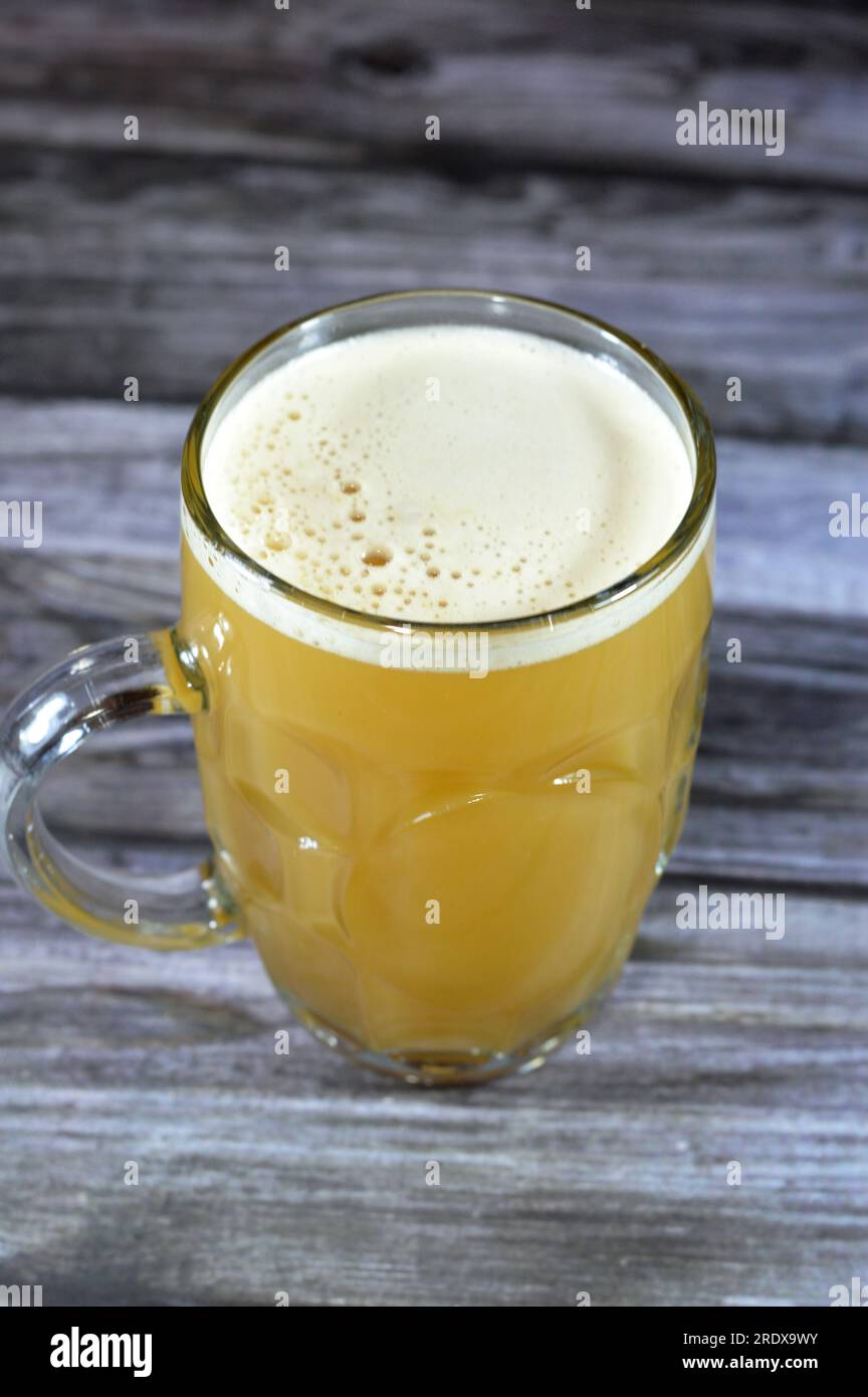 Sugarcane juice, the liquid extracted from pressed sugarcane. It is ...
