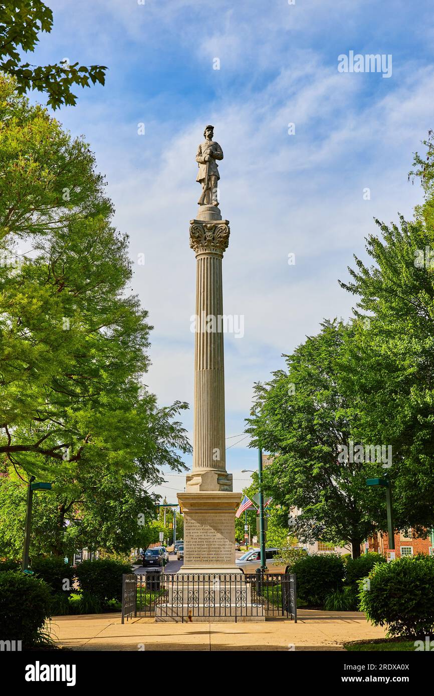 Vertical of soldier statue atop tall Greek pillar in Public Square park ...