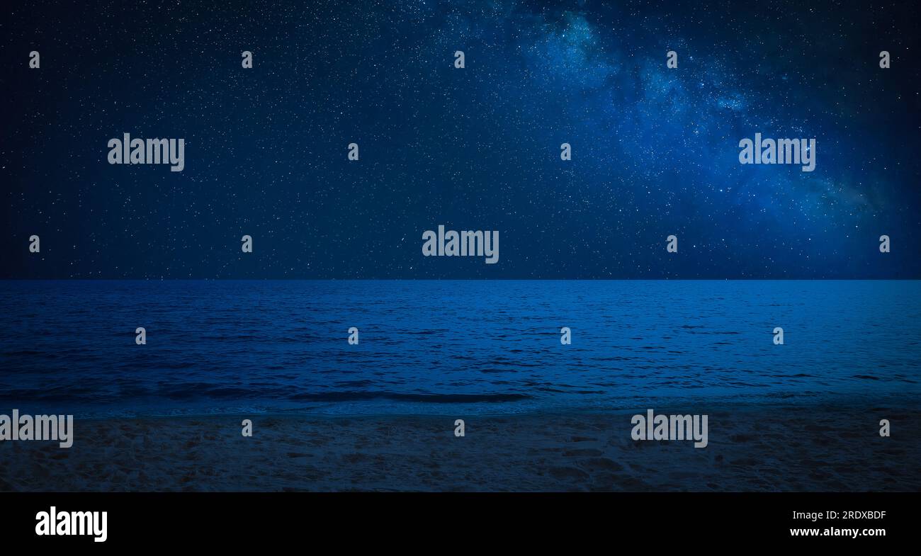 Amazing starry sky over sea at night Stock Photo - Alamy