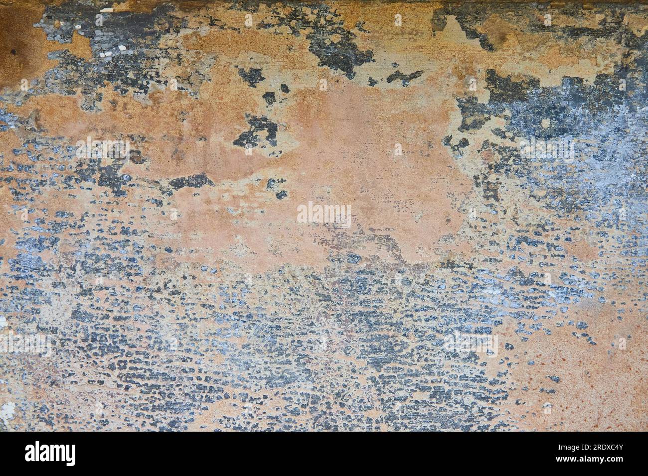 Textured horizontal background asset of tan concrete wall with shiny ...