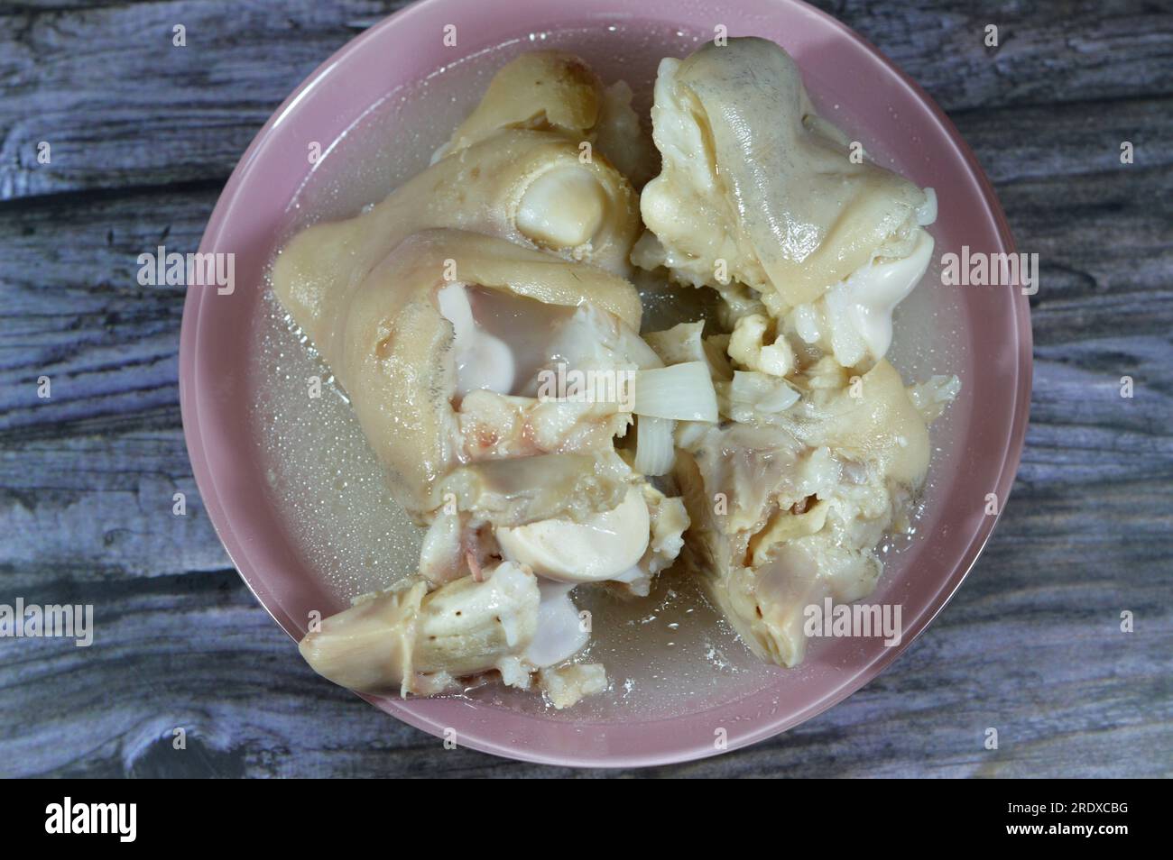 Arabic Egyptian cuisine of kawareh trotters with its traditional soup ...