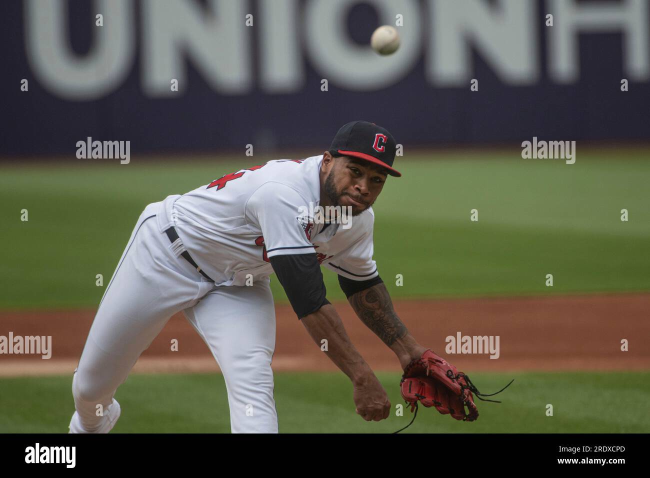 Cleveland Guardians starting pitcher Xzavion Curry delivers against the ...