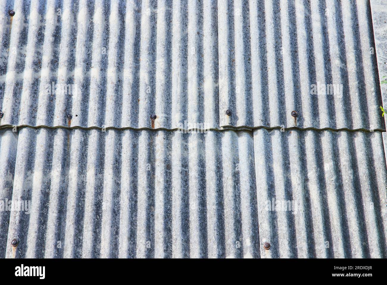 Wavy, crinkled, metal iron wall or roof, overlapping siding Stock Photo ...