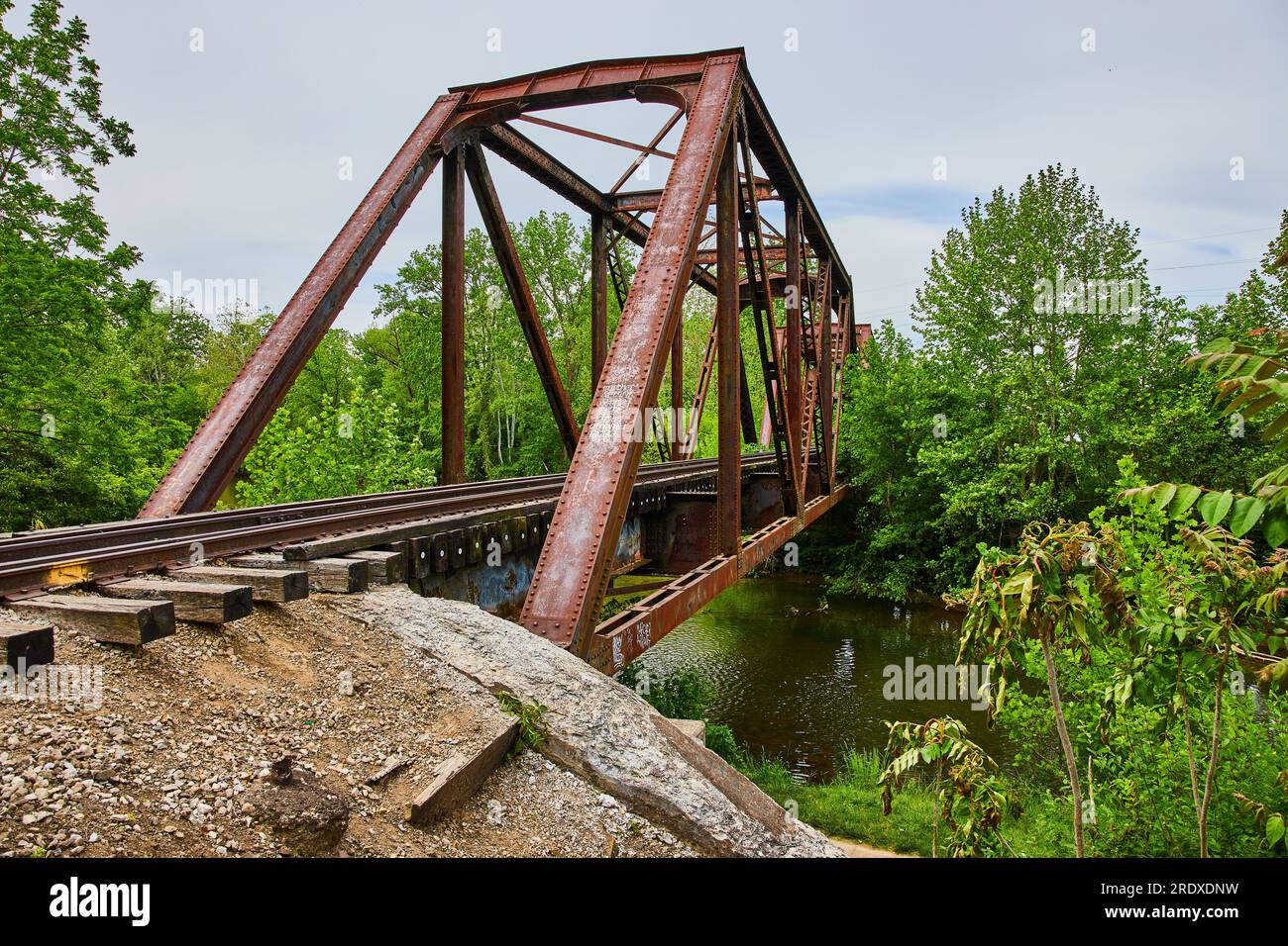 Rusty iron railroad bridge Heart of Ohio Trail with Kokosing River ...
