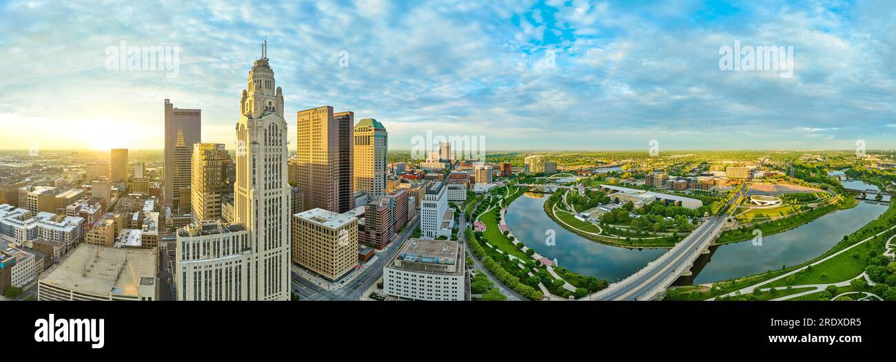 Panorama aerial with downtown skyscrapers on one side and city on the ...