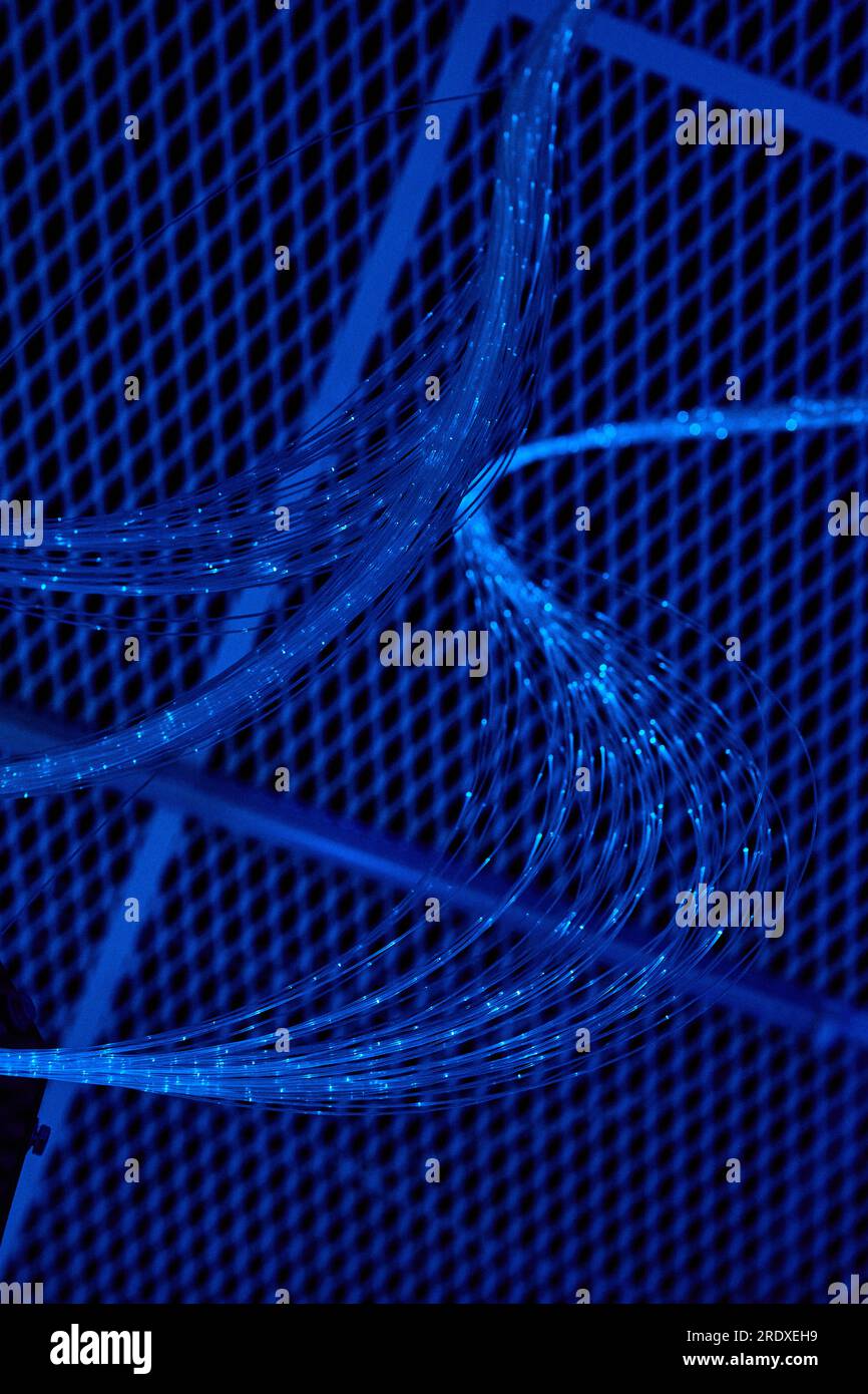 Wired mesh of blue cables and wires background asset Stock Photo - Alamy