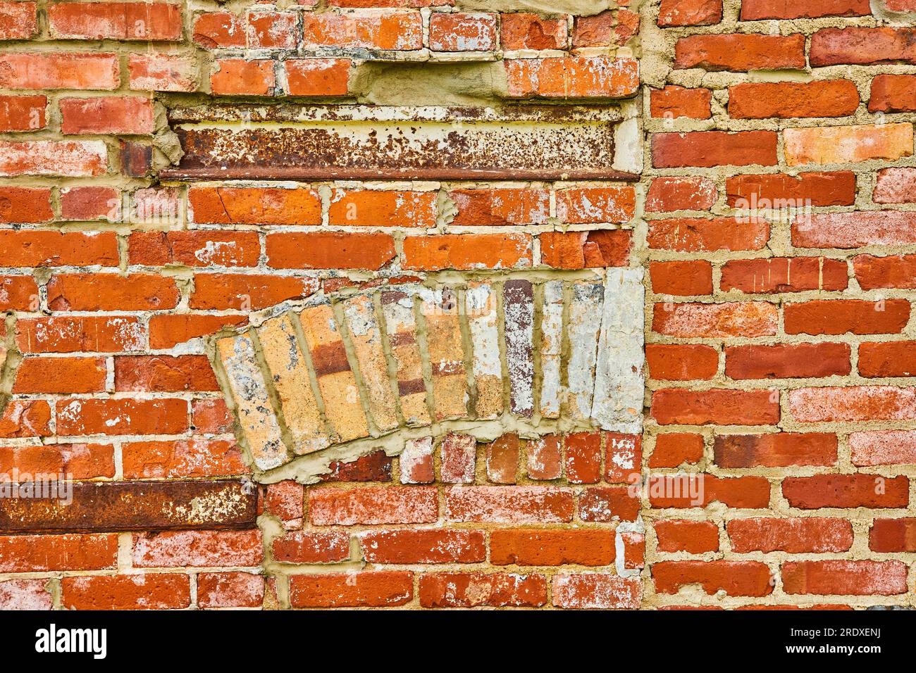 Partially concealed doorway with white bricks as archway and straight ...
