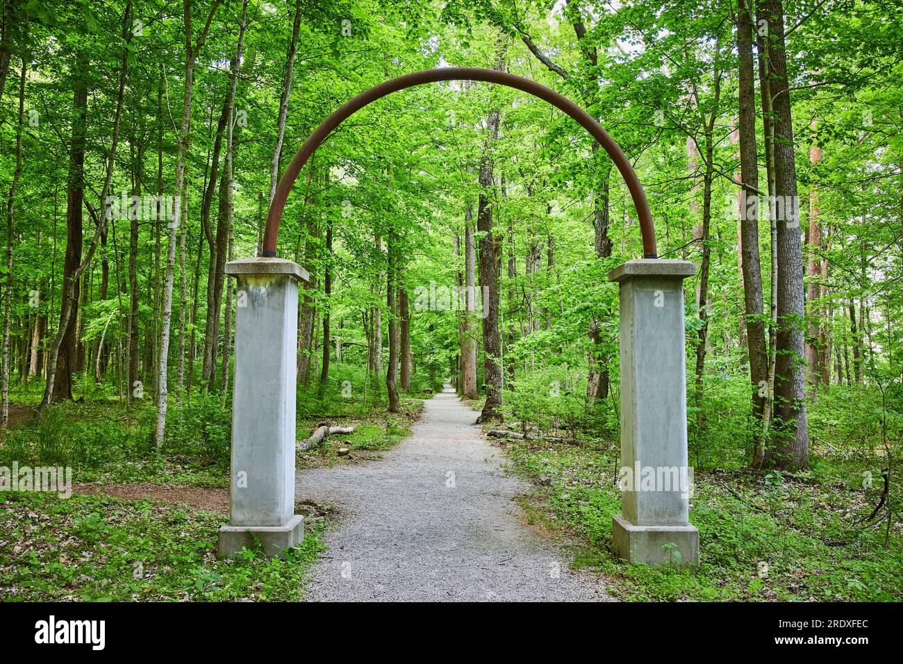 Trail, paved path through Walkway of Roses in destroyed amusement park ...