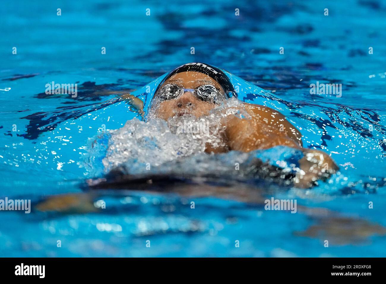 Felicity Passon of Seychelles competes in the women's 100m backstroke ...