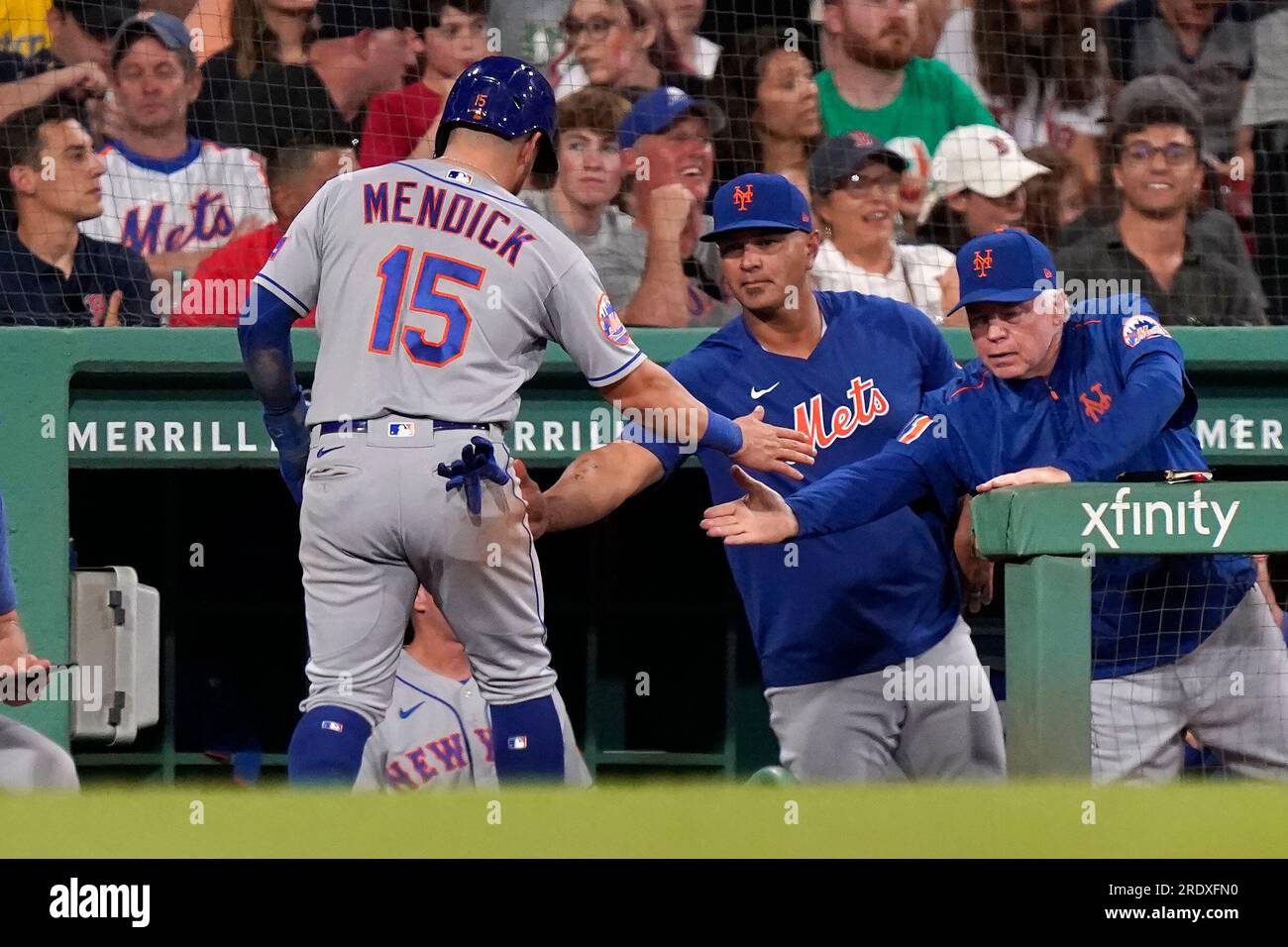 New York Mets' Danny Mendick (15) is welcomed to the dugout after ...