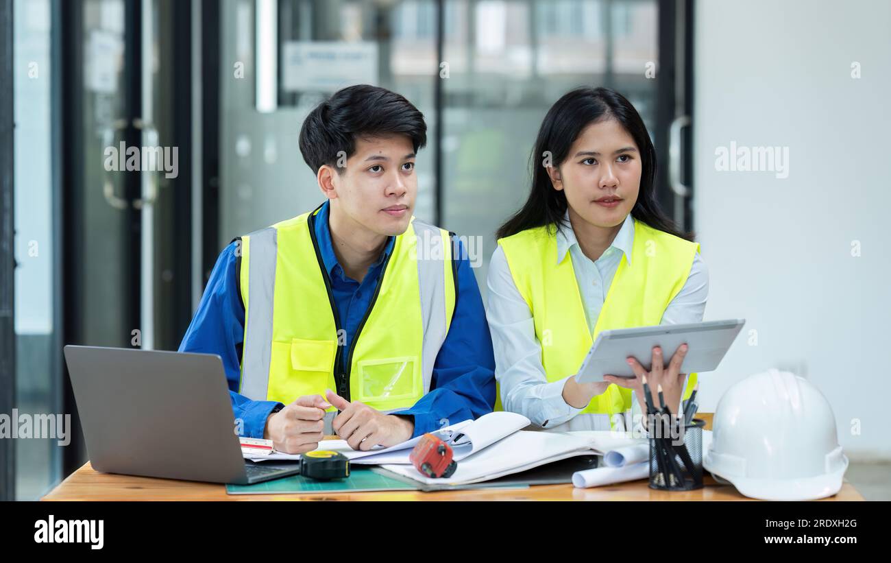 Civil engineers and architects listening brief from the chief Stock ...