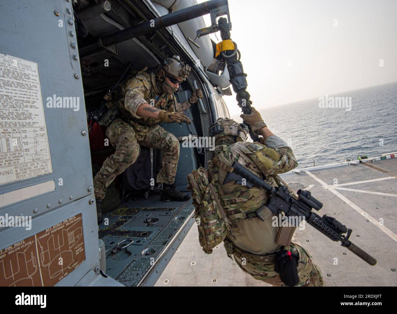 230720-N-NH267-1924 GULF OF OMAN (July 20, 2023) U.S. service members ...