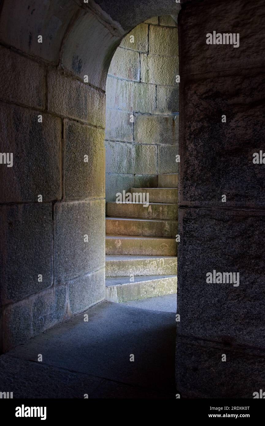 A pinched view of circular stone steps that lead to the Long Alley at ...