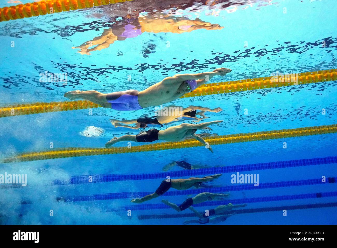 Pan Zhanle, top, of China, competes in a men's 200-meter freestyle heat ...