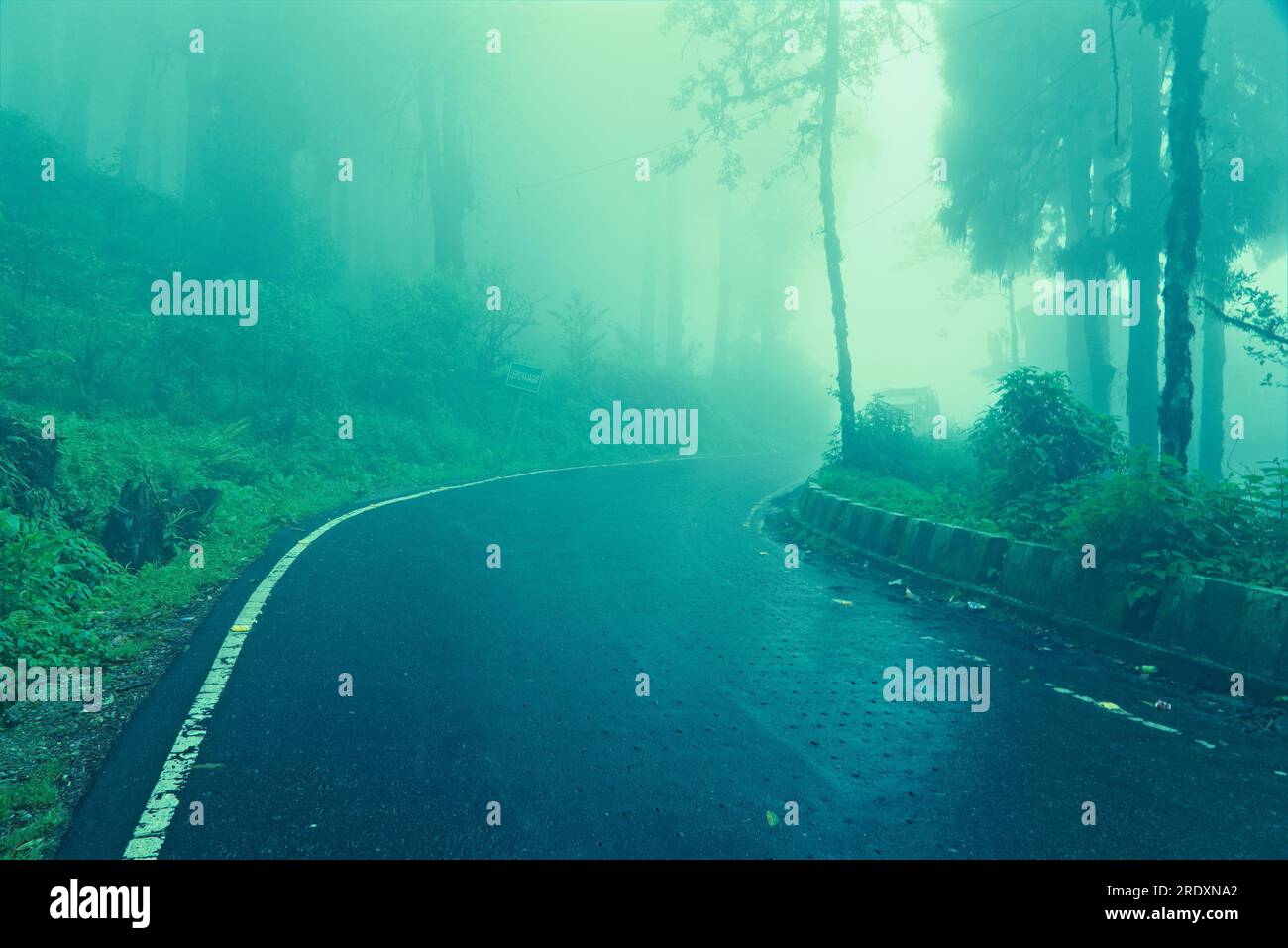 view of wet rainy road in a village in India Stock Photo - Alamy