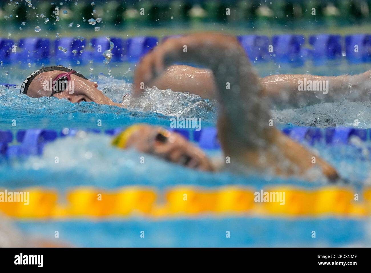 Isabel Gose of Germany, left, competes in the women's 1500m freestyle ...