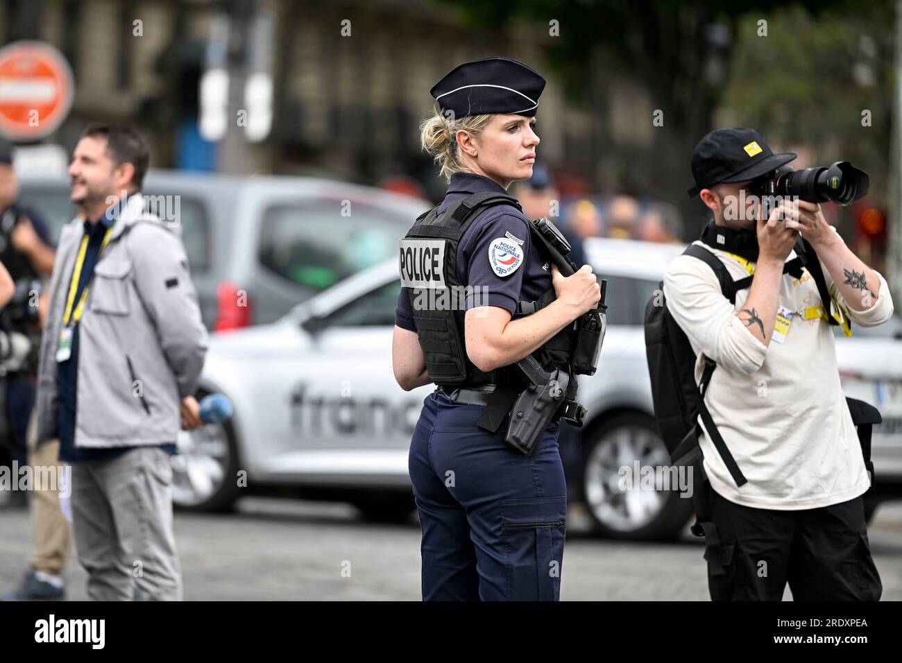 A French police woman officer (policewoman) during the stage 21 of the ...