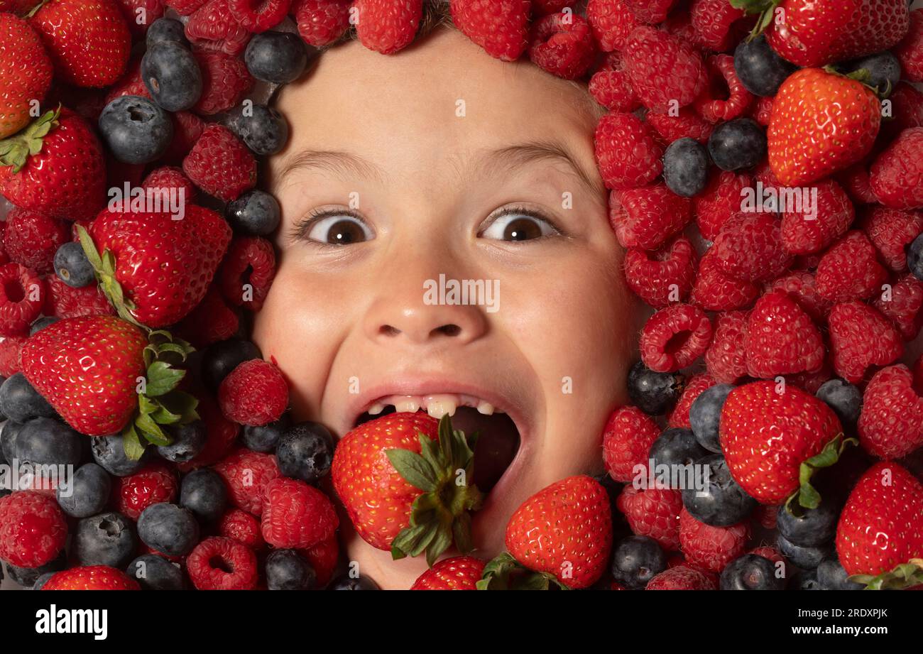 Funny fruits. Strawberry, blueberry, raspberry, blackberry background ...