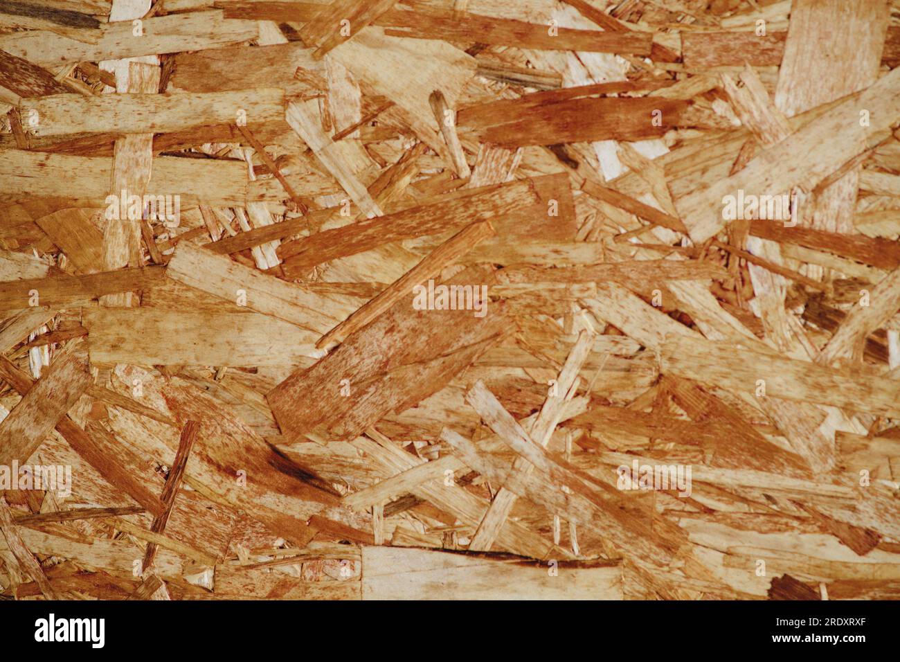 Chipboard background, wooden texture of chipboard material closeup ...
