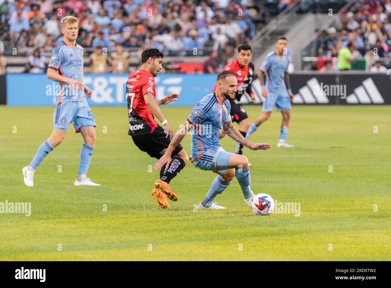 New York, USA. 23rd July, 2023. Maxime Chanot (4) of NYCFC controls ...