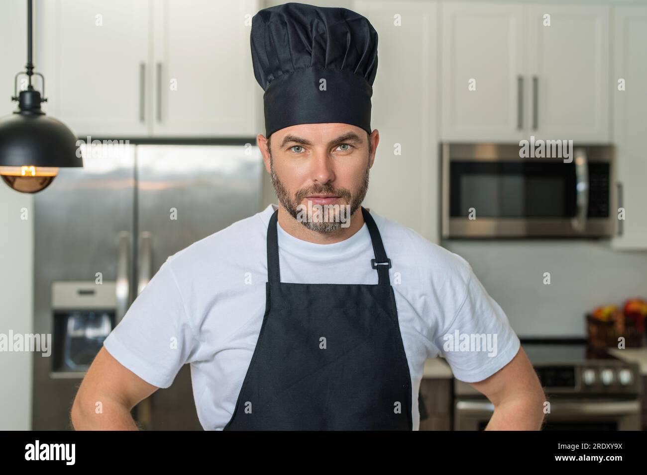 Man chef cooker baker. Millennial male chef in chefs uniform. Chef man ...