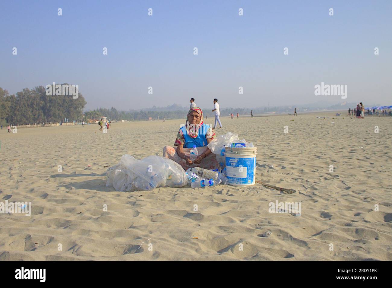 she is a sea beach cleaner Stock Photo - Alamy