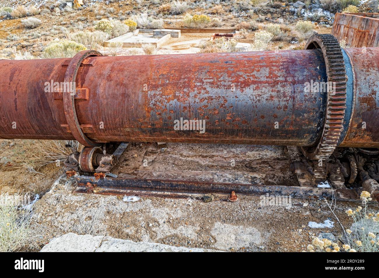A section of a big rusty pipe at an abandoned mercury mine, Nevada, USA ...