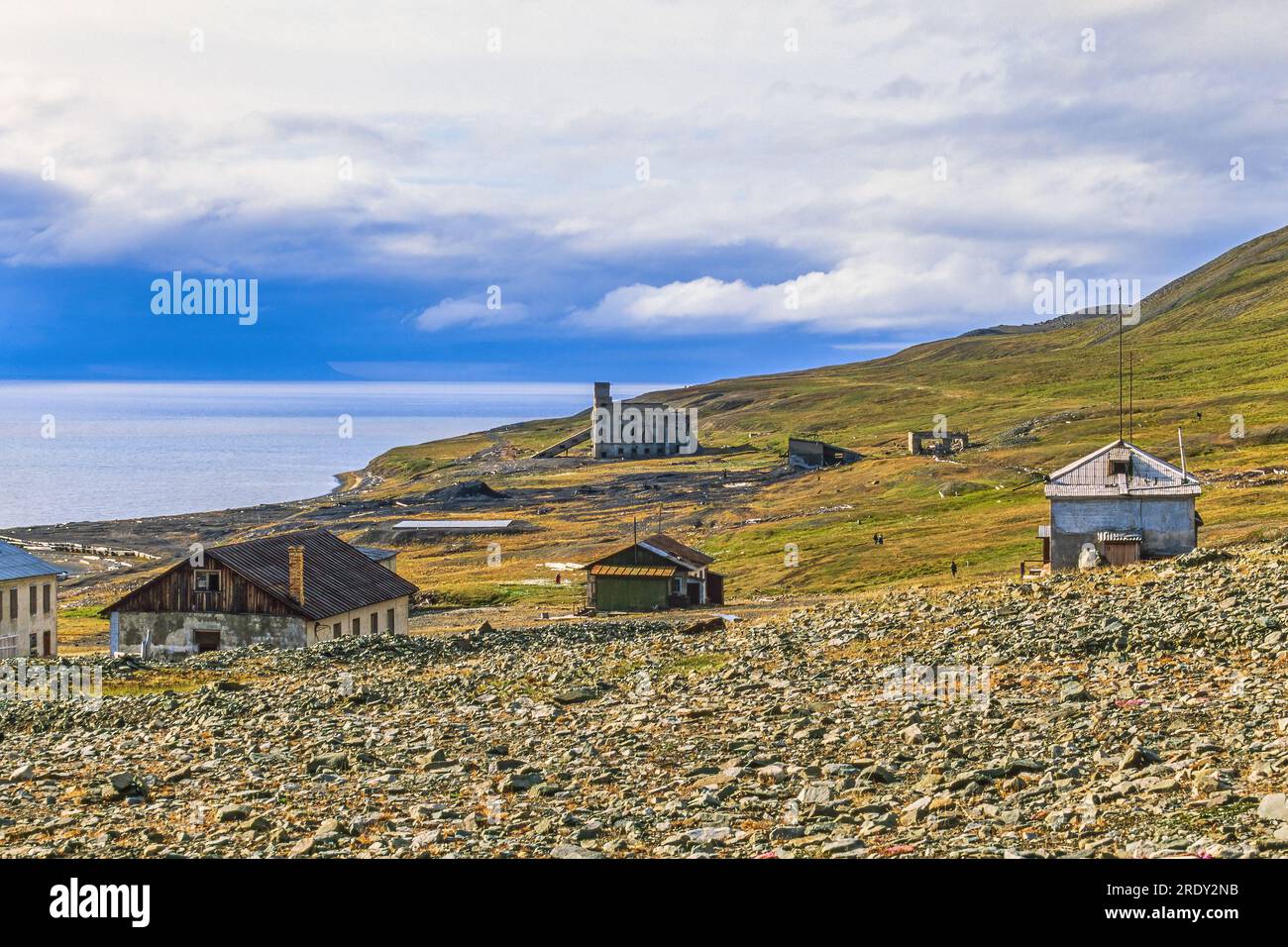 Old mining village on the coast of Svalbard Stock Photo - Alamy