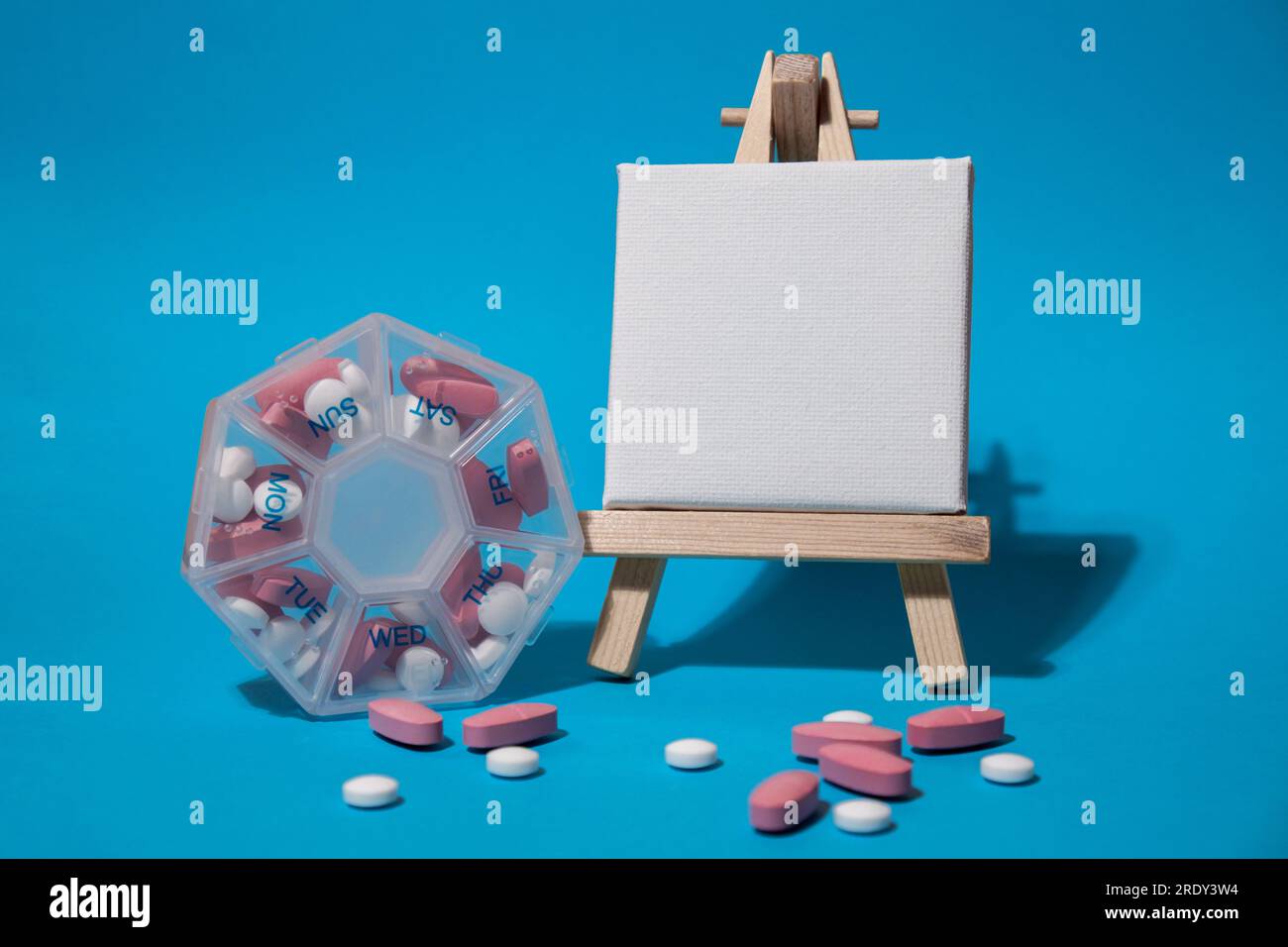 Closeup of medical pill box with doses of tablets for daily take ...