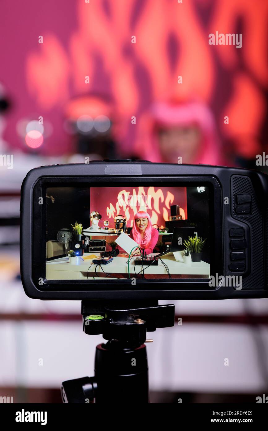 Asian vlogger advertising white box at camera reviewing product while ...