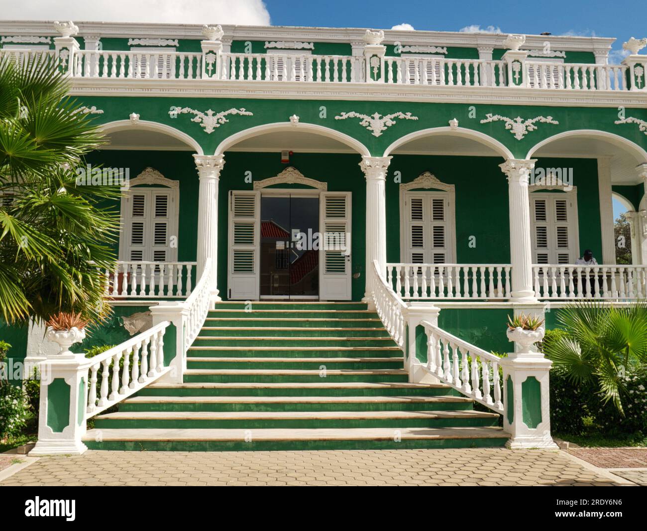 Green painted Dutch colonial style building - one of many beautiful ...