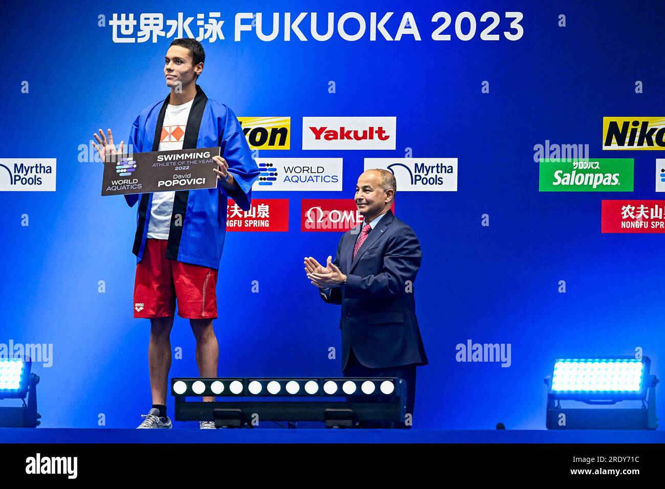 Fukuoka, Japan. 23rd July, 2023. David Popovici of Romania receives ...