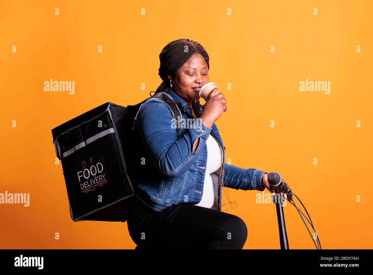 Woman carrying takeout box hi-res stock photography and images - Alamy