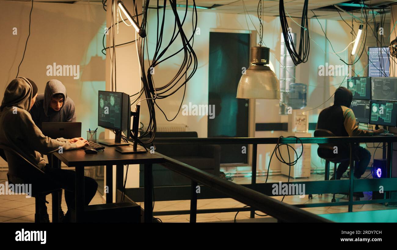 Male hacker committing cybercrime hi-res stock photography and images ...