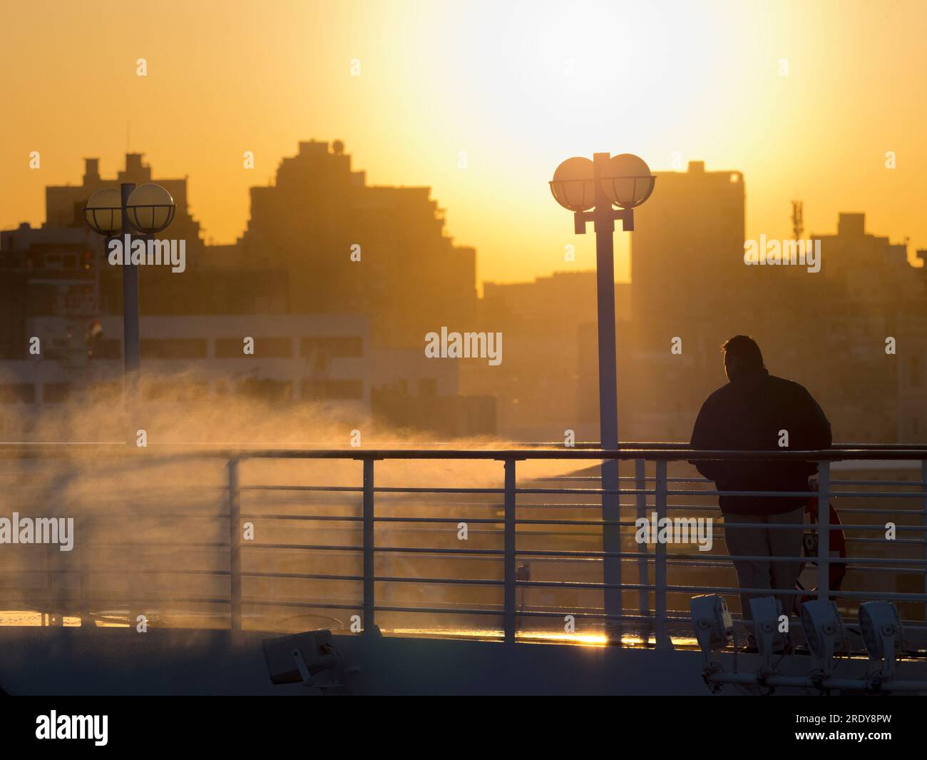 Spray spraying water around building hi-res stock photography and ...