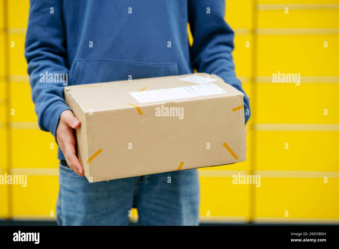 Boy with package hi-res stock photography and images - Alamy